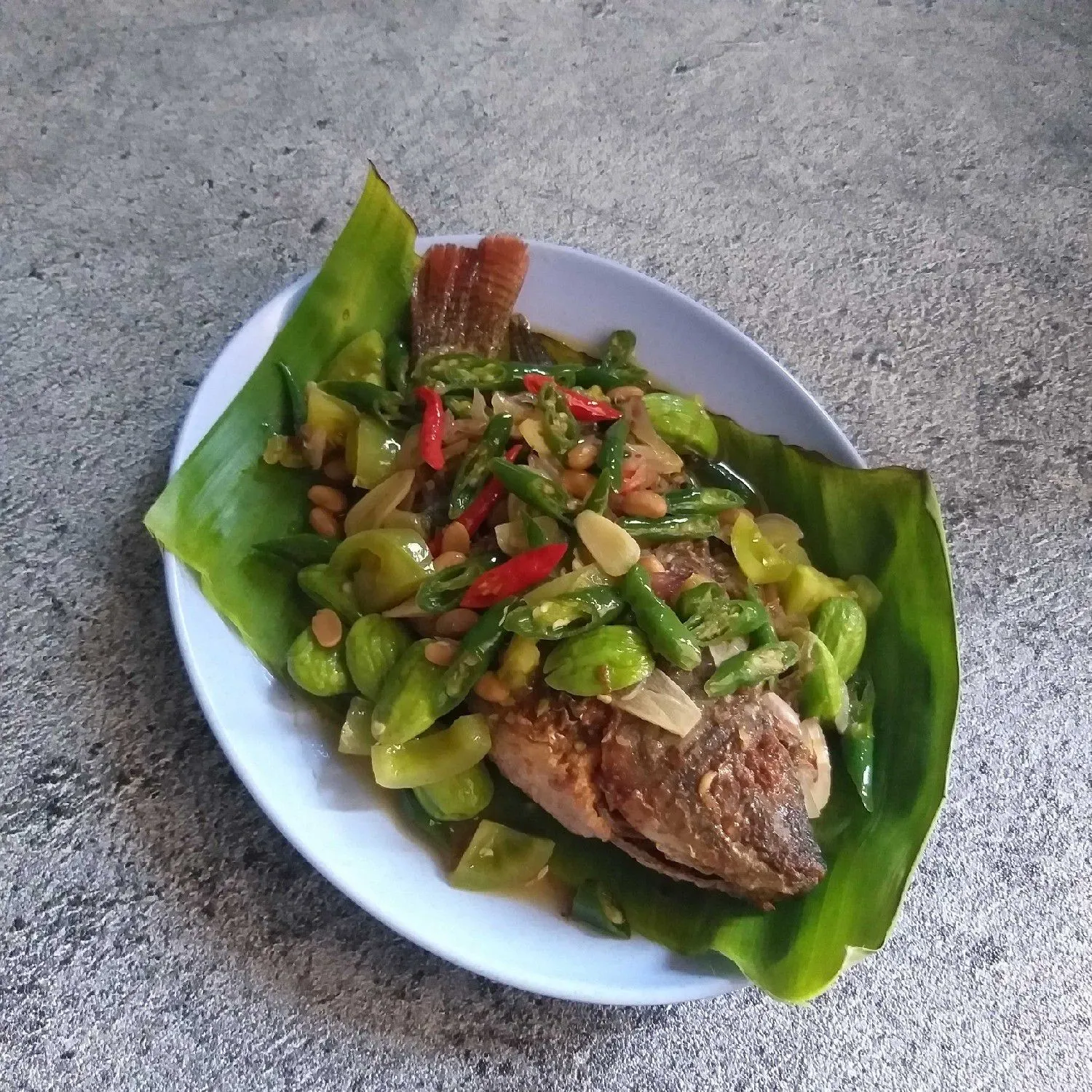 Resep Ikan Nila Pete Tauco Sederhana Rumahan di Yummy App Resep Ikan Nila Pete Tauco Sederhana Rumahan di Yummy App