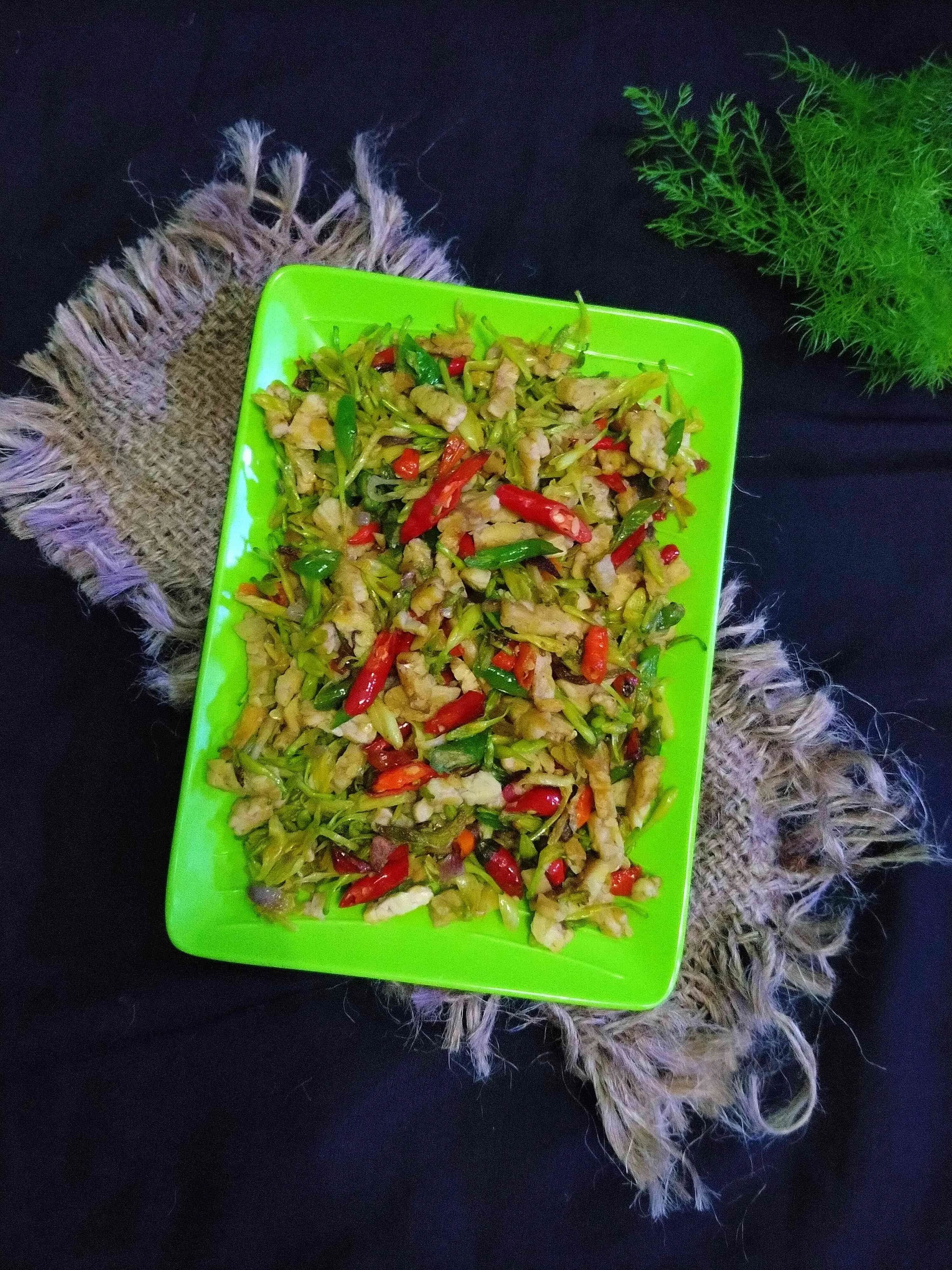 Resep Tumis Bunga Pepaya Tempe Pedas Sederhana Rumahan di Yummy App