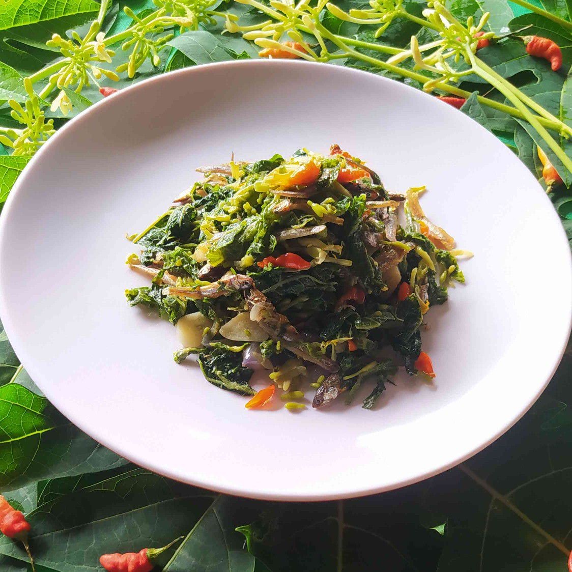 Resep Tumis Bunga Dan Daun Pepaya Sederhana Rumahan di Yummy App